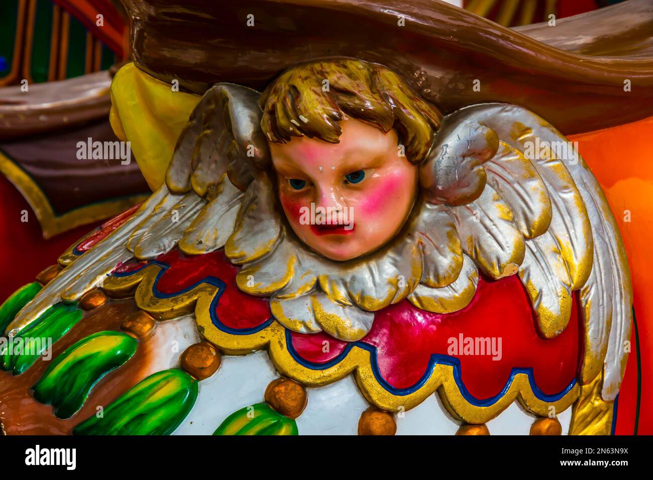 Angel On Carrousel Horse Stock Photo - Alamy