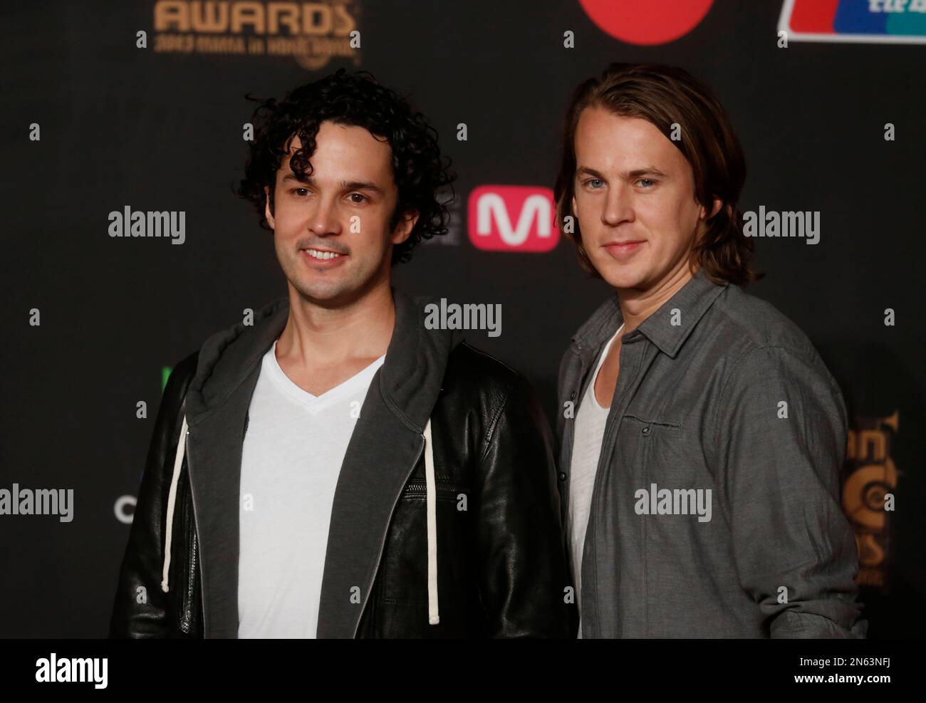 Members of Norwegian duo Ylvis pose for photographers on the red carpet ...