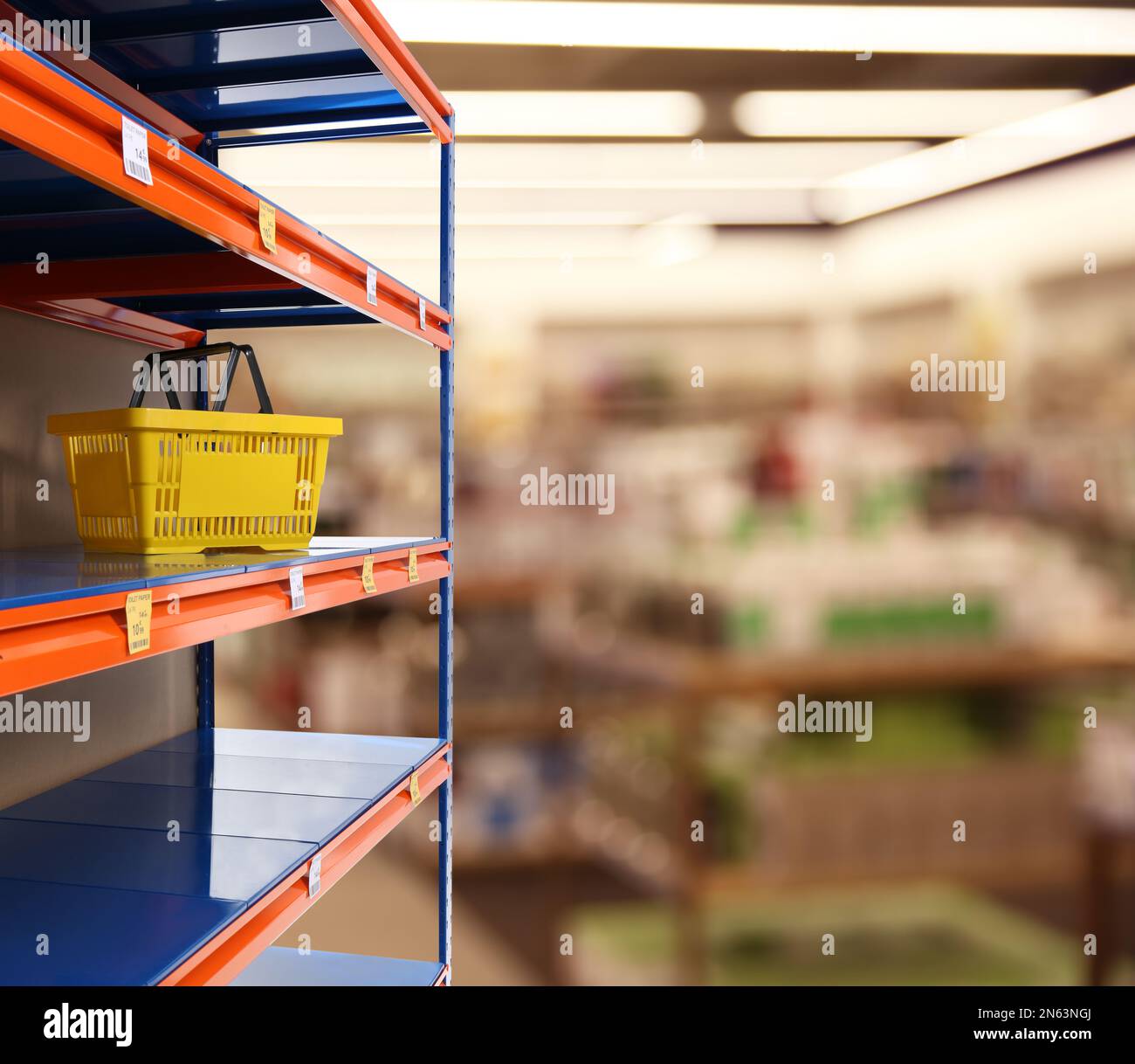 Empty shelves in supermarket, closeup. Product deficiency due to social ...