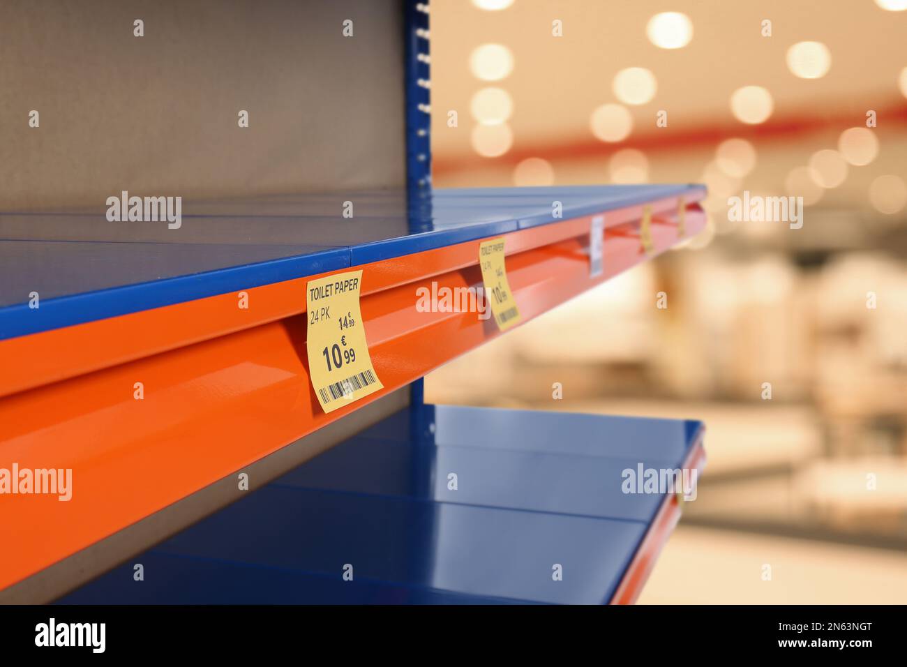 Empty shelves in supermarket, closeup. Product deficiency due to social ...