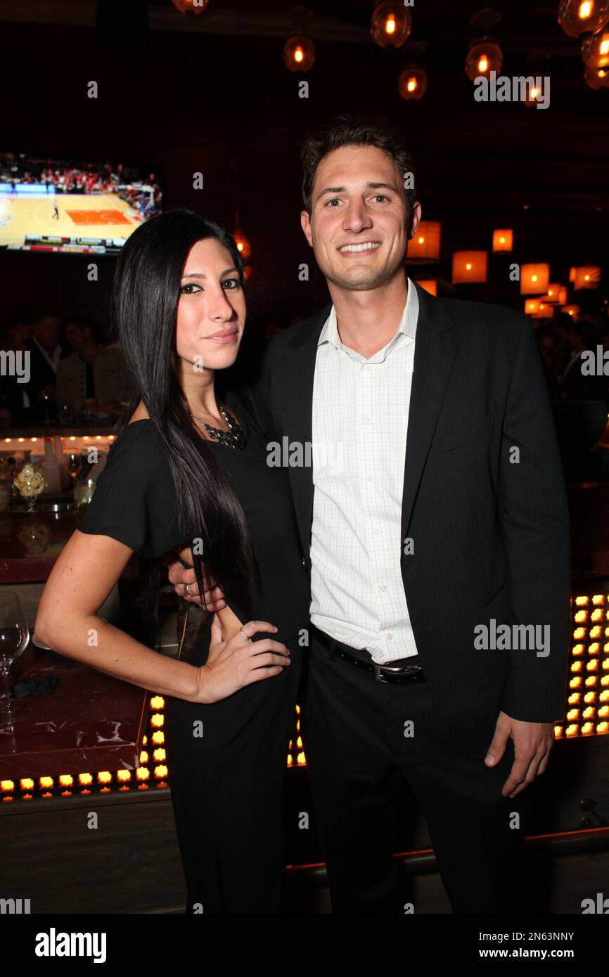From left, Sasha Lauren and Chris Martin pose during a party at Red O ...