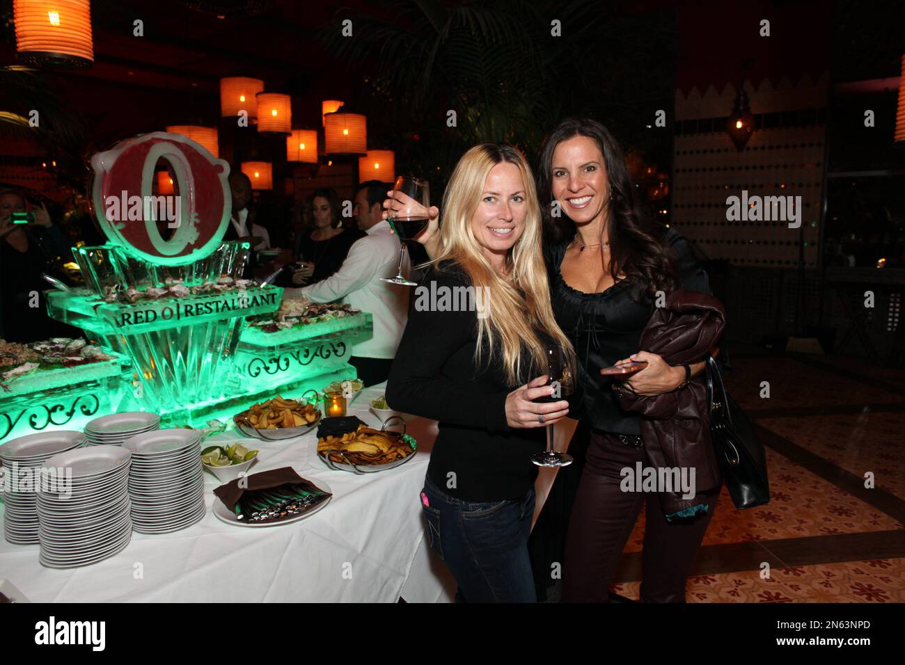 From left, Susan Seaman and Cheri Kahler pose during a party at Red O ...