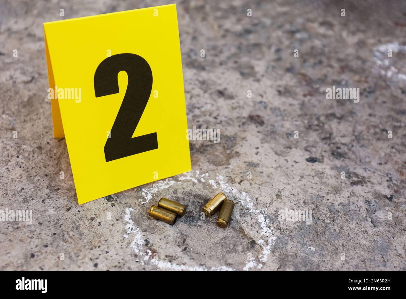 Crime scene with bullet shells and evidence mark on floor. Detective ...