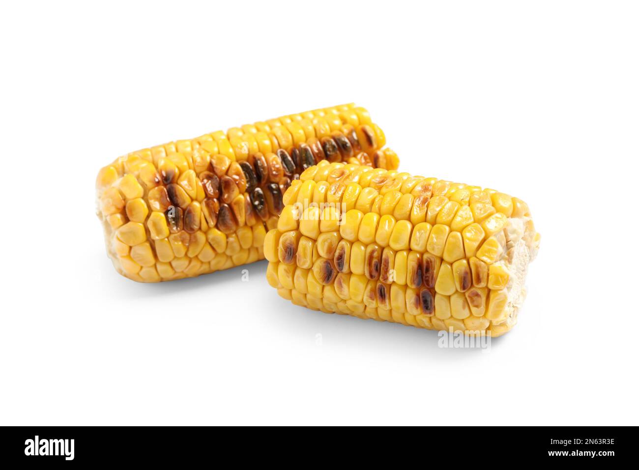 Tasty grilled corn cobs on white background Stock Photo - Alamy
