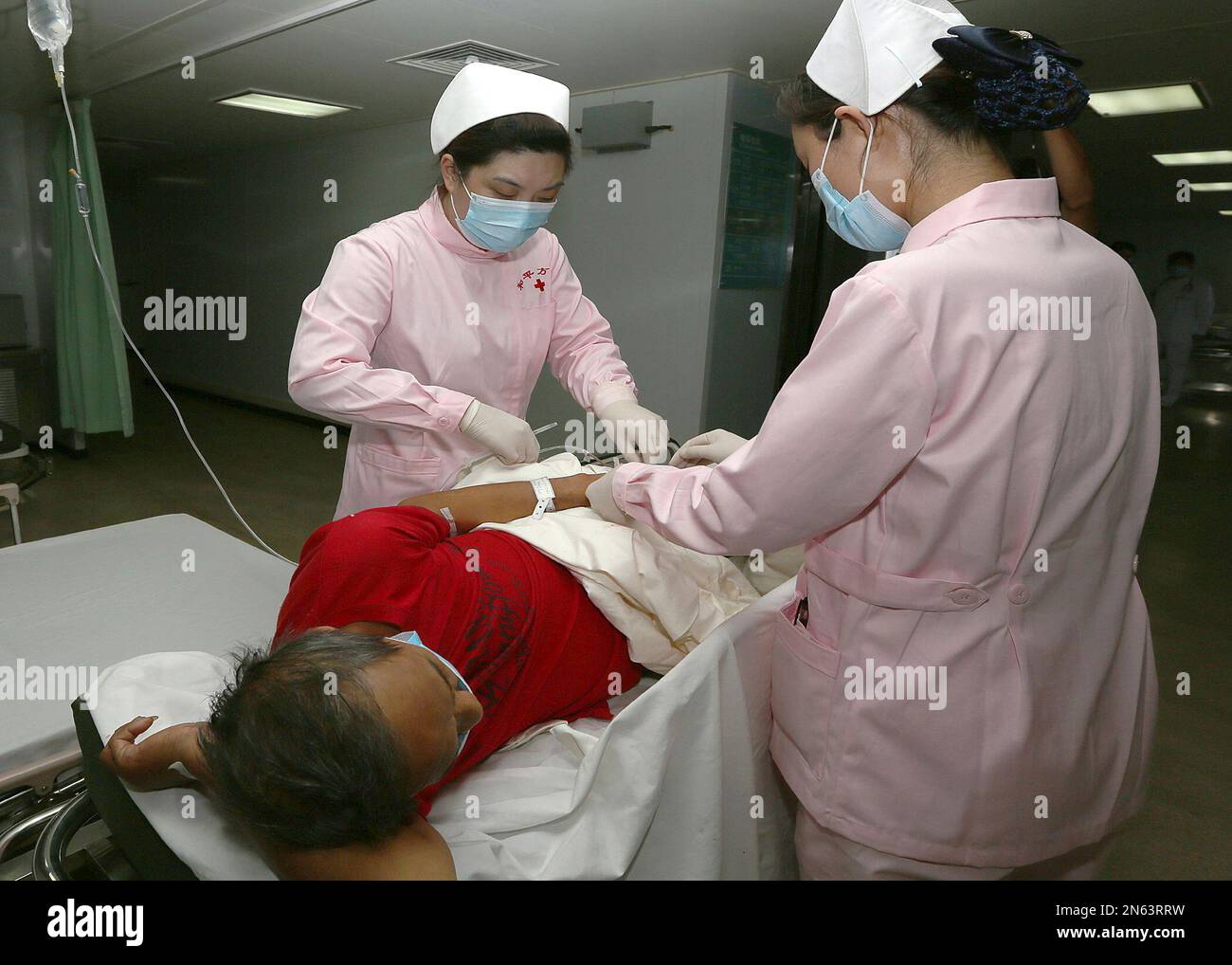 Chinese medical personnel aboard the People's Liberation Army hospital ...