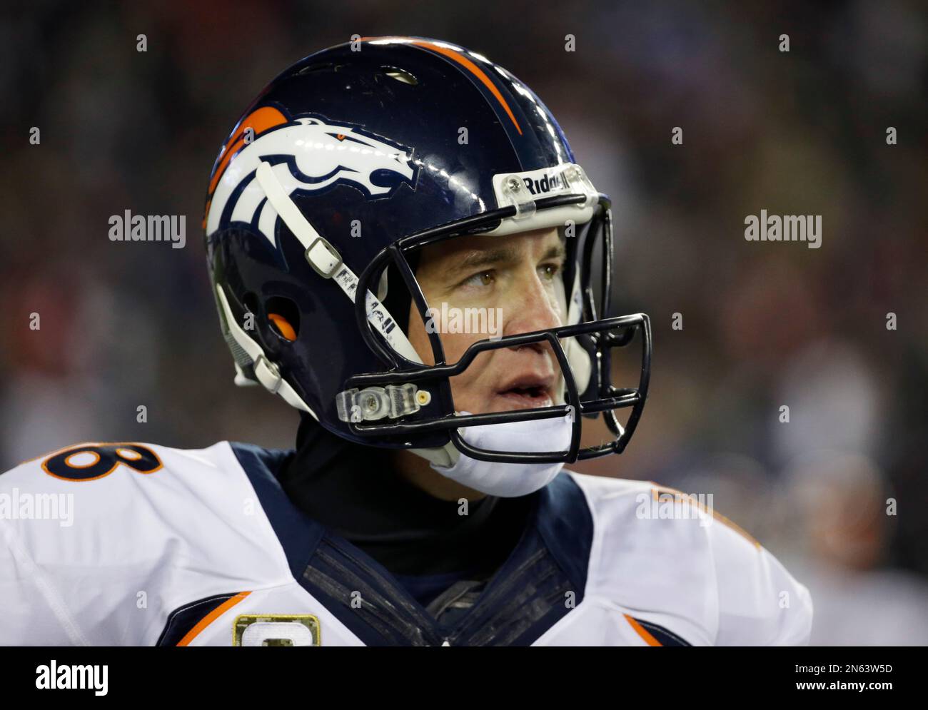 Denver Broncos quarterback Peyton Manning checks the scoreboard in the ...