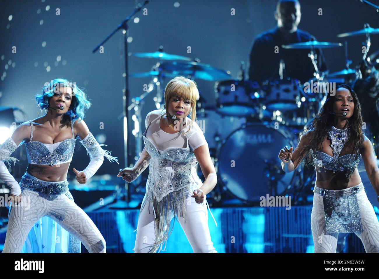 From right, Chilli and T-Boz of the musical group TLC perform with Lil ...
