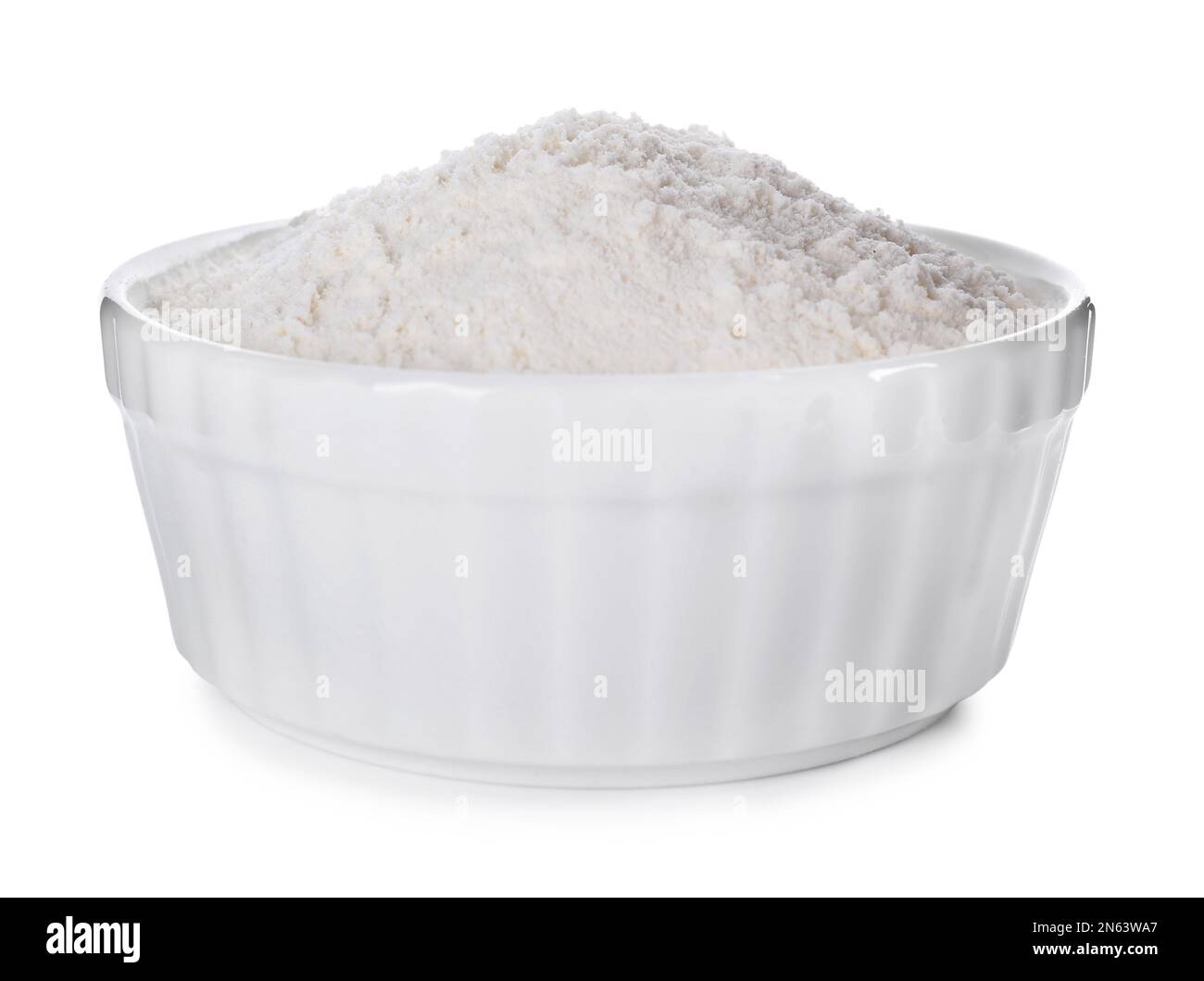 Organic flour in bowl isolated on white Stock Photo - Alamy