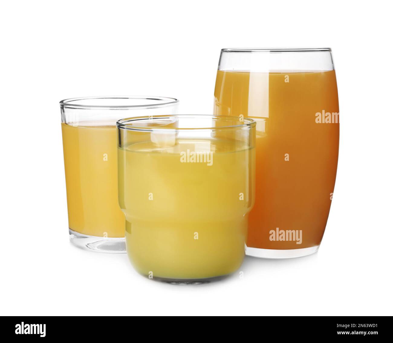 Glasses of delicious juice isolated on white Stock Photo - Alamy