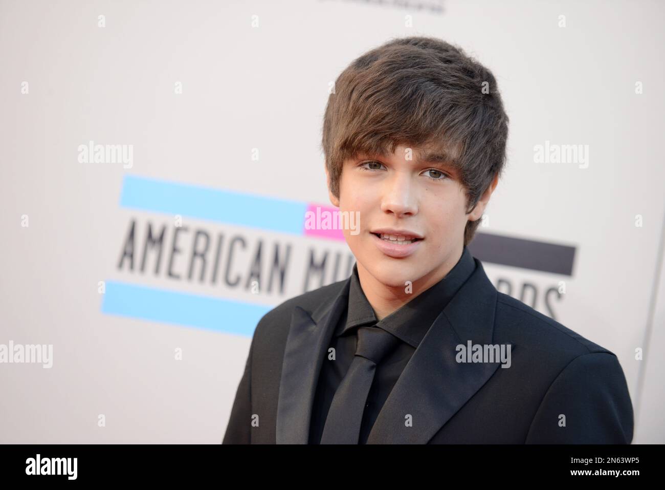 Austin Mahone arrives at the American Music Awards at the Nokia Theatre ...