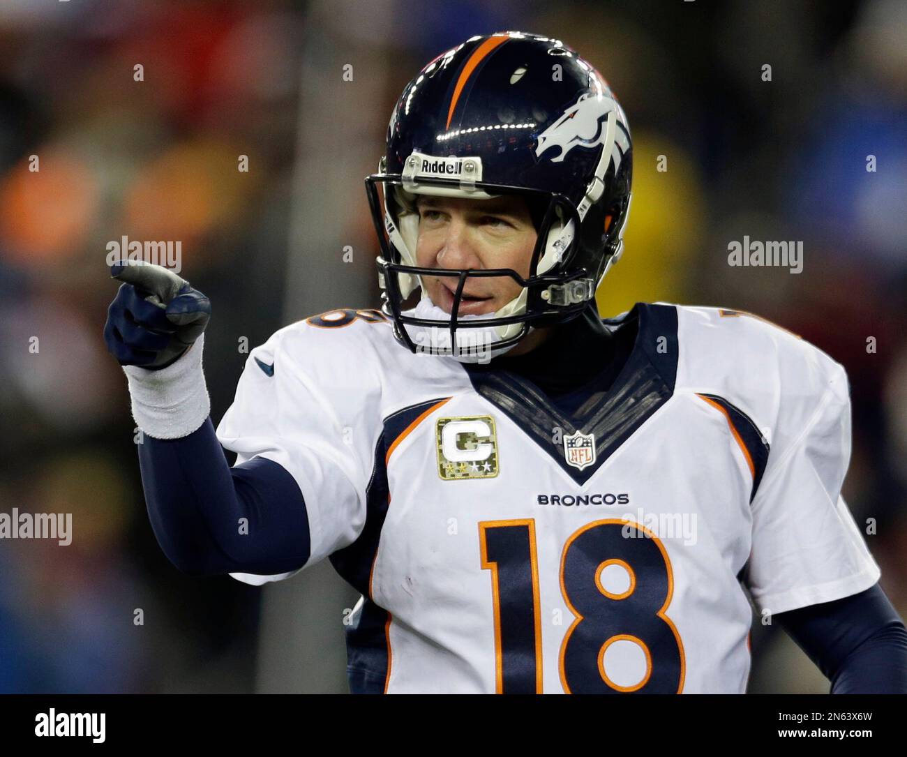 Denver Broncos quarterback Peyton Manning reacts to a touchdown by ...