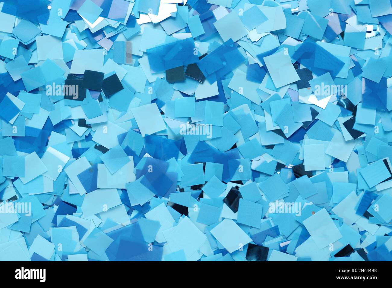 Light blue confetti as background, top view Stock Photo - Alamy