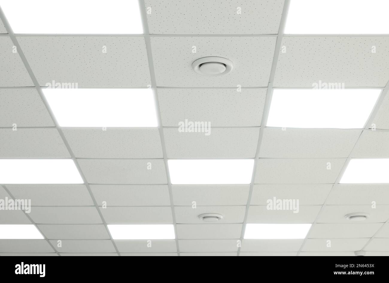 White ceiling with lighting in office room Stock Photo - Alamy