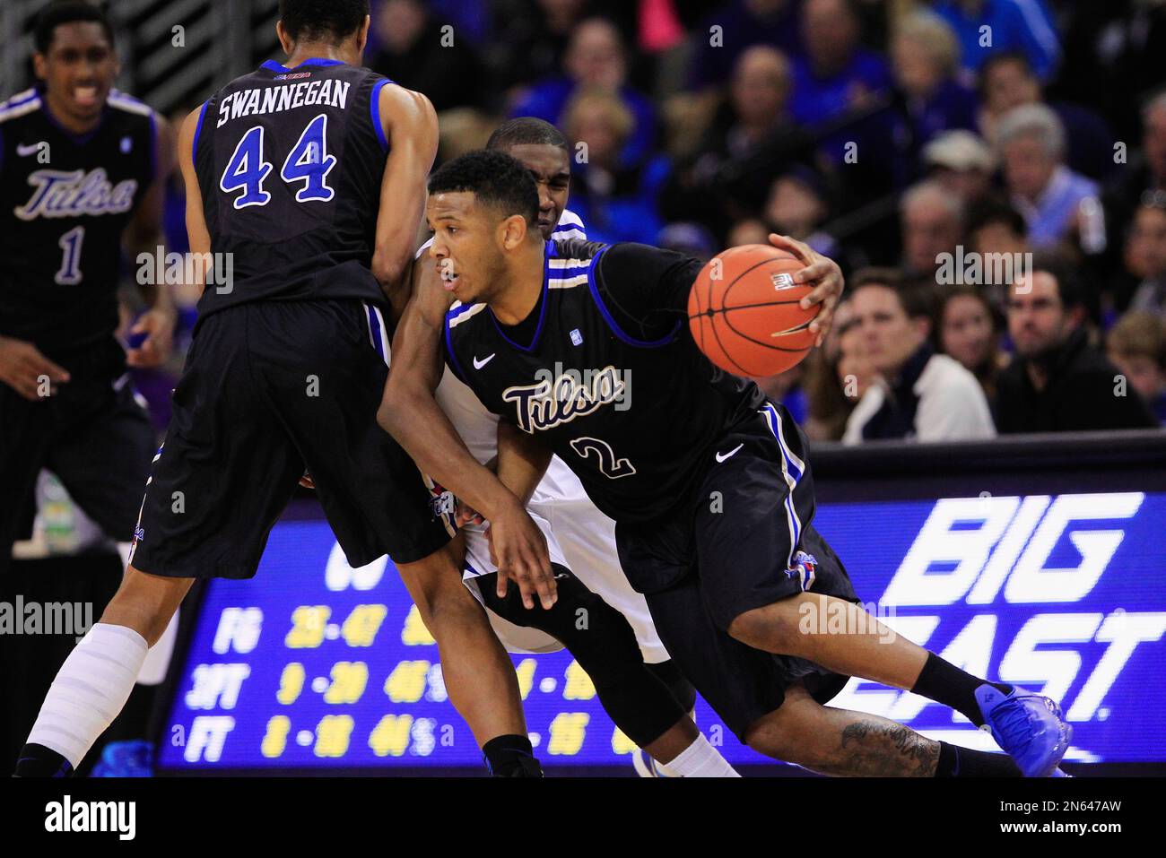 Tulsa guard Pat Swilling Jr. (2) drives past Creighton guard Jahenns ...