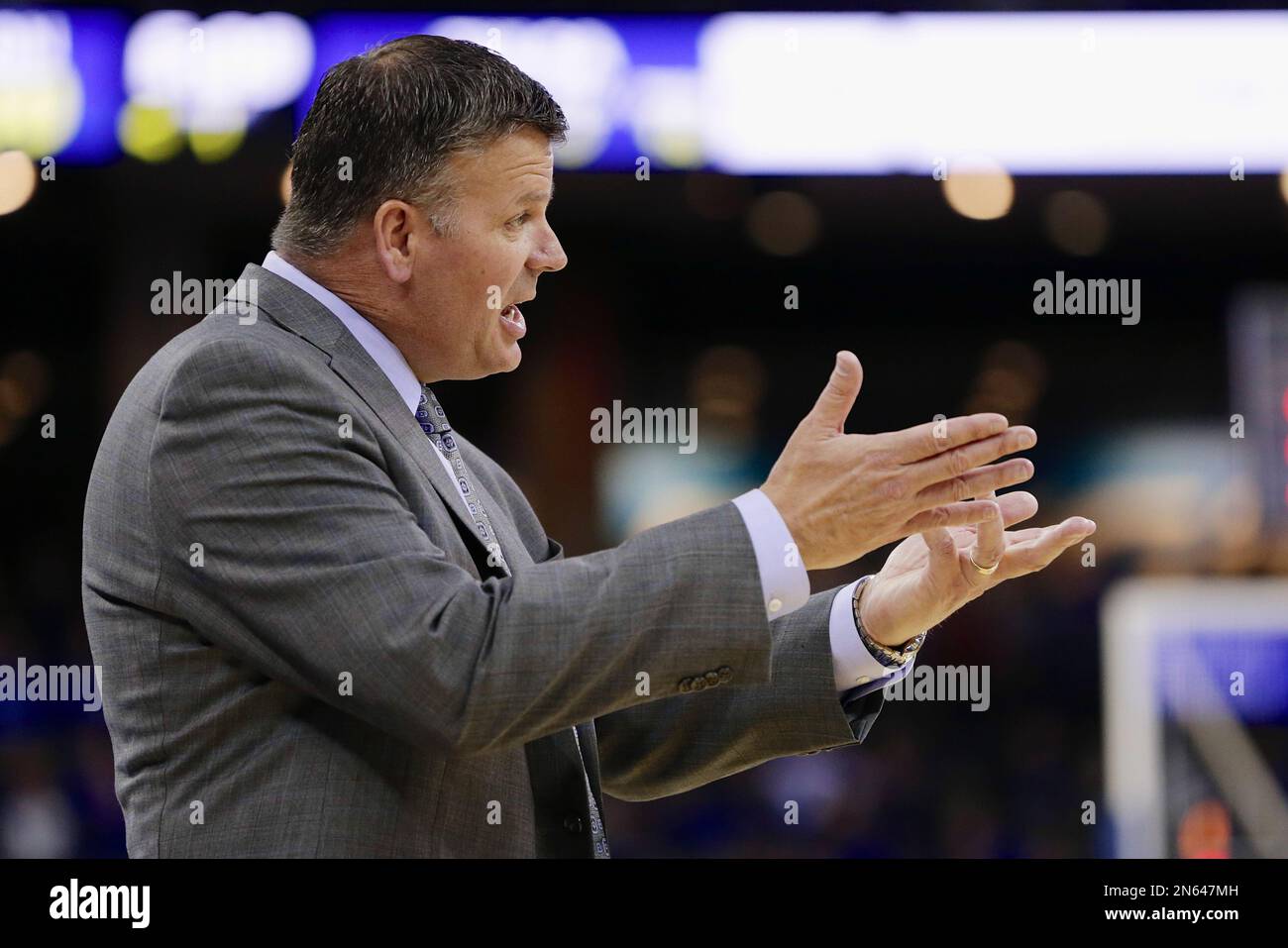 Creighton coach Greg McDermott argues a call by an official in the ...