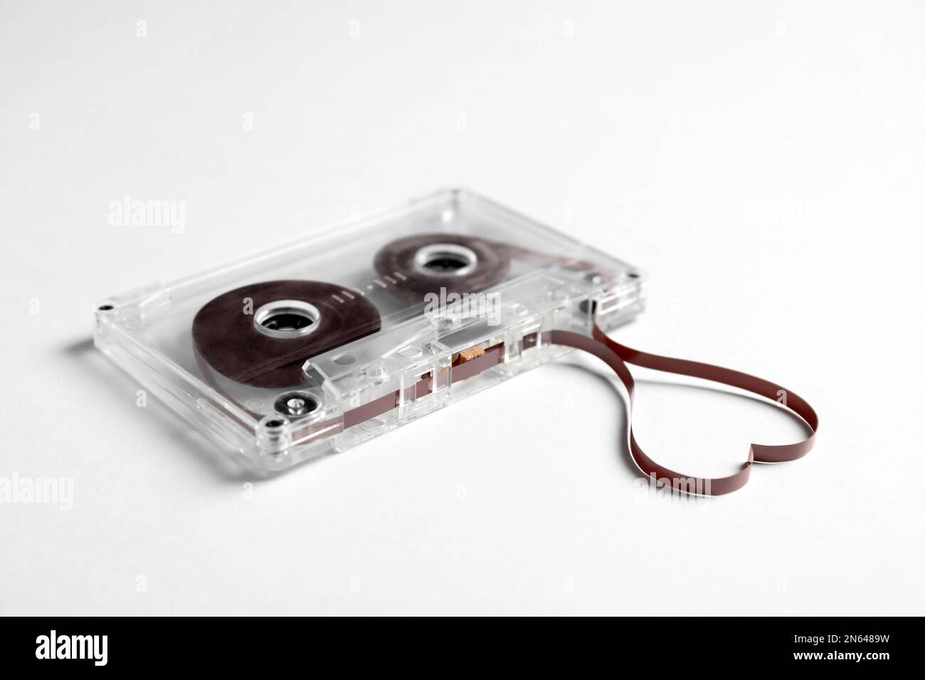 Music cassette and heart made with tape on white background. Listening ...