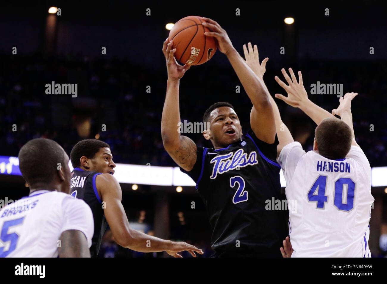 Tulsa Guard Pat Swilling Jr. (2) shoots past Creighton forward Zach ...