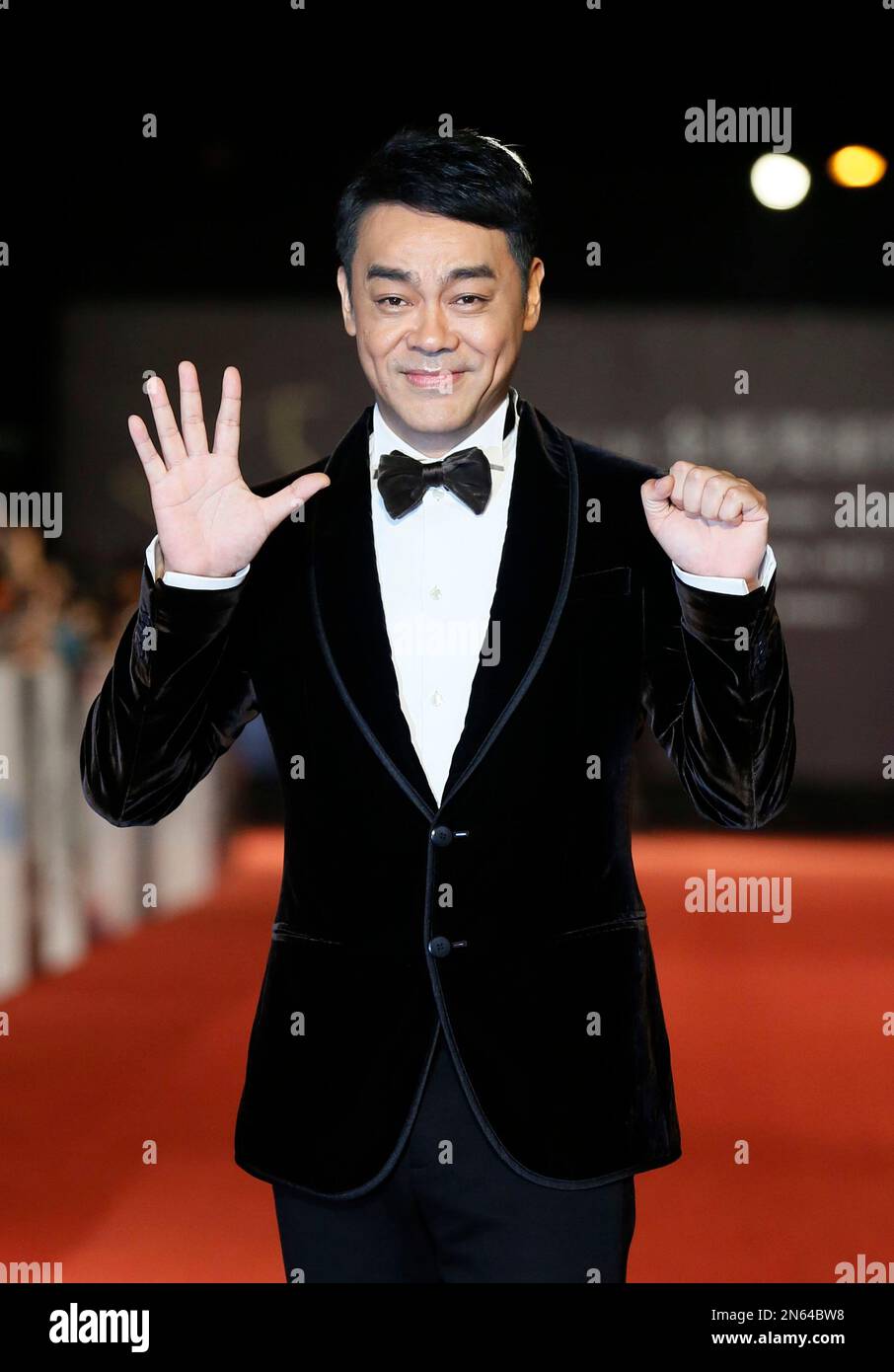 Hong Kong actor Sean Lau poses on the red carpet at the 50th Golden ...