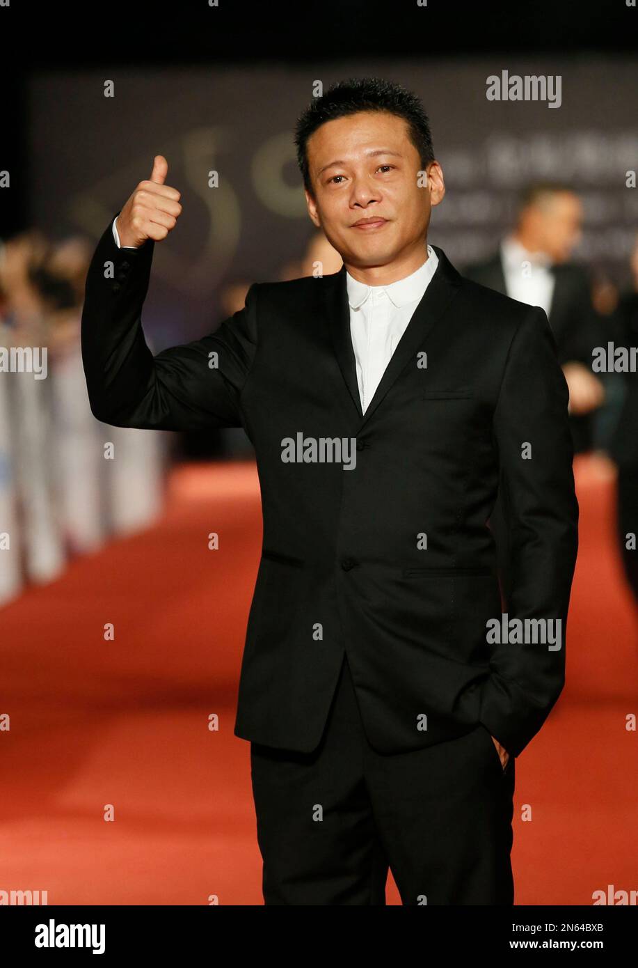 Taiwanese actor Lee Kang Sheng arrives at the 50th Golden Horse Awards ...
