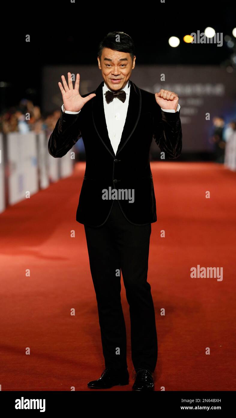 Hong Kong actor Sean Lau poses on the red carpet at the 50th Golden ...