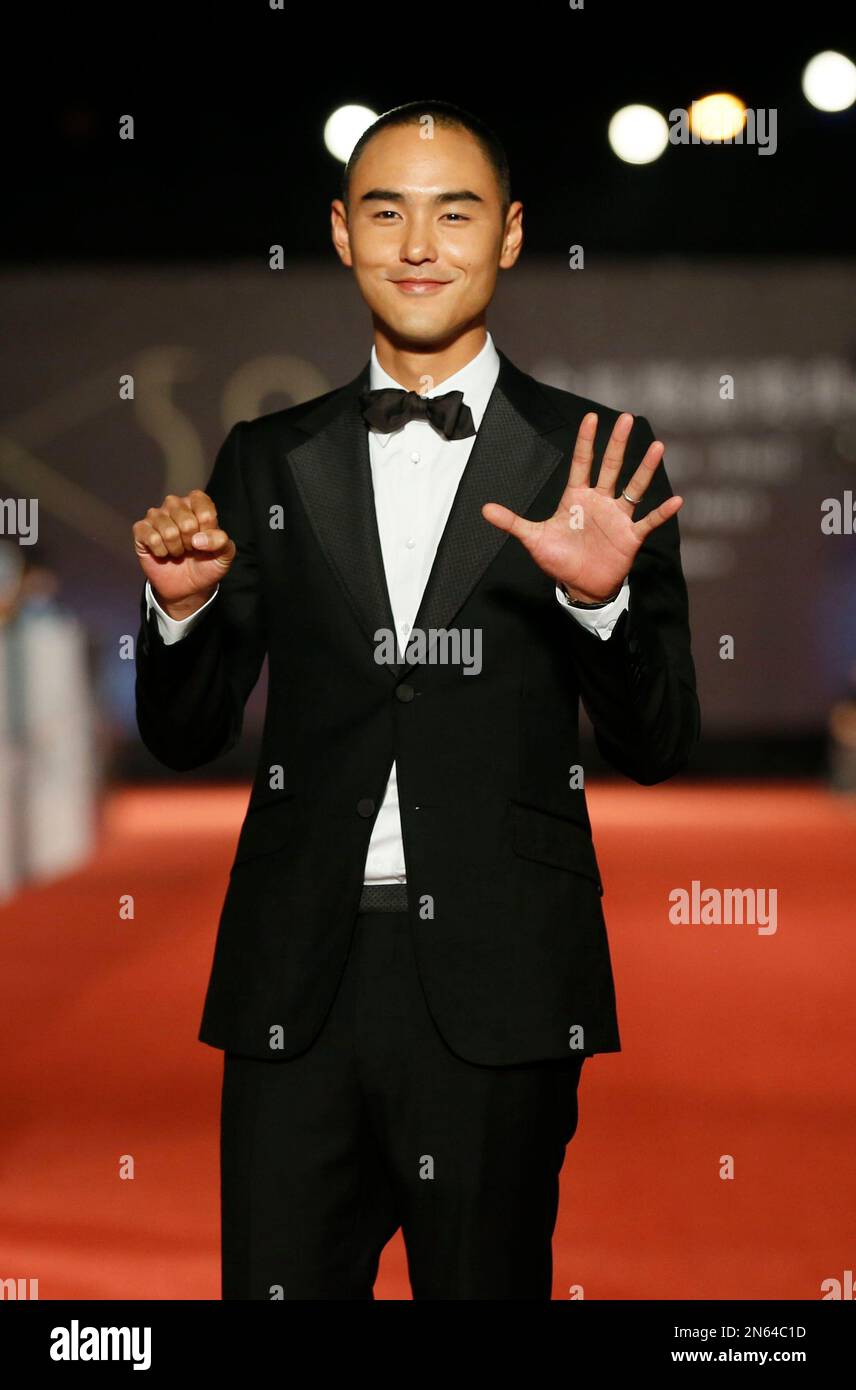 Taiwanese actor Ethan Juan poses on the red carpet at the 50th Golden ...