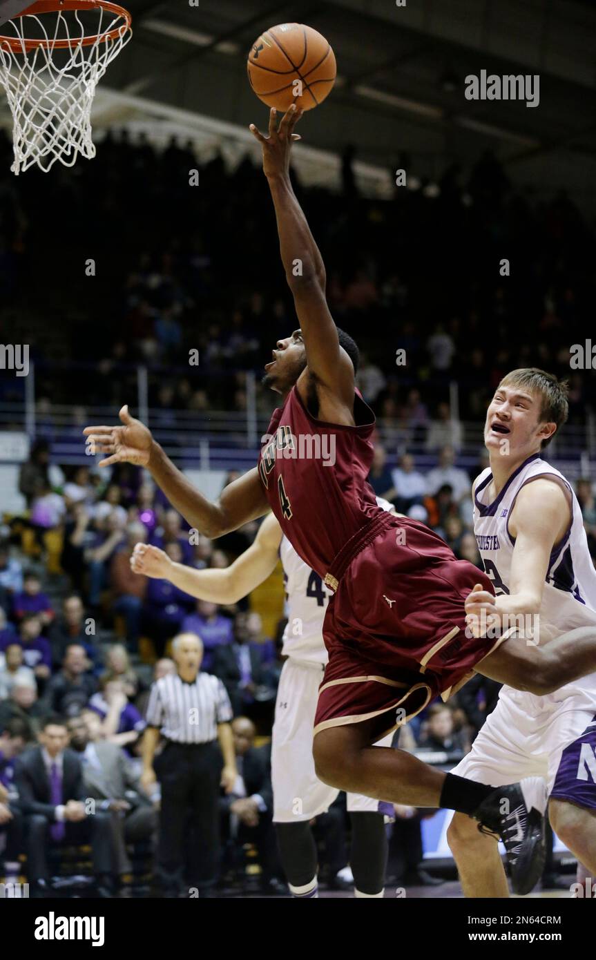 IUPUI guard Ian Chiles, left, shoots against Northwestern during the ...