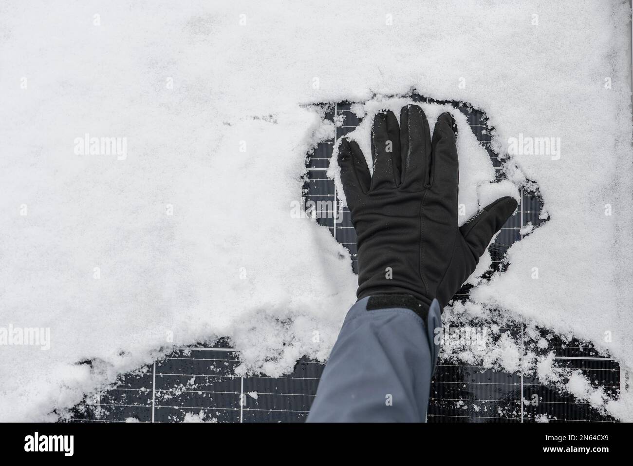 renewable energy in winter time. Getting electricity with solar panels ...