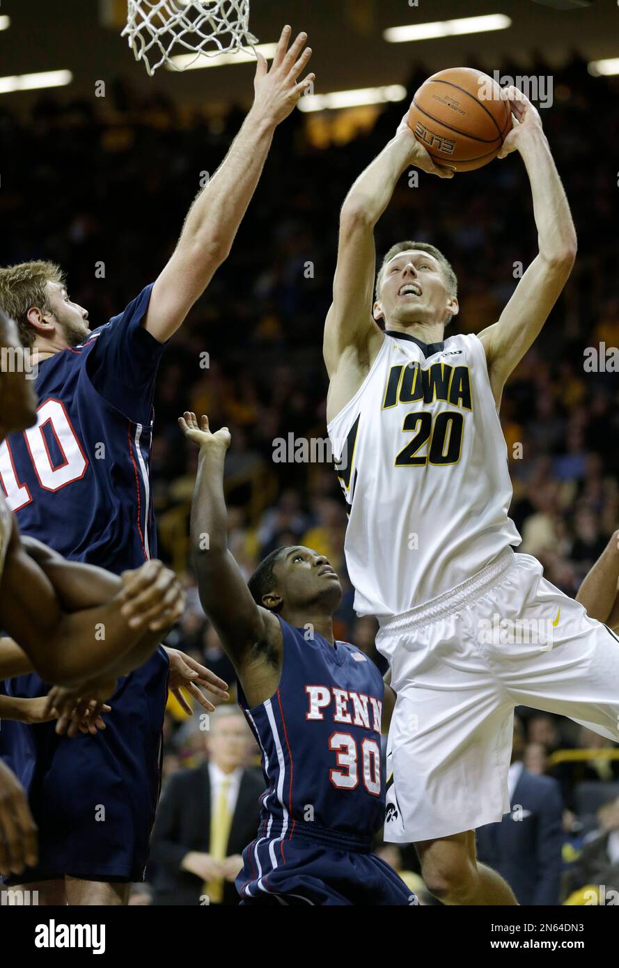 Iowa forward Jarrod Uthoff (20) shoots over Penn's Darien Nelson-Henry ...