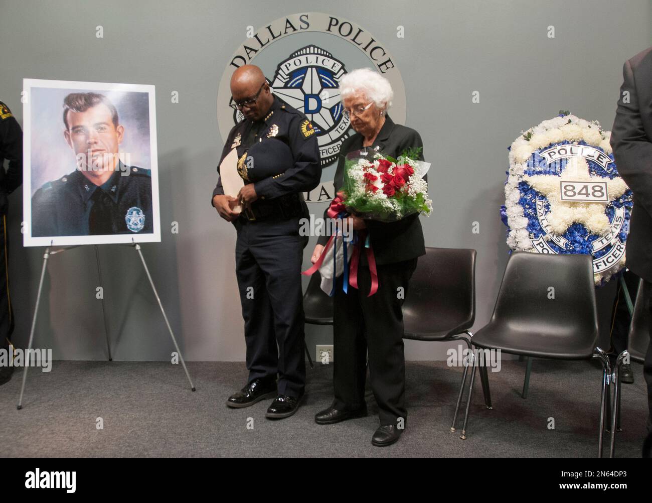 Dallas Police Chief David Brown, left, stands with Marie Tippit, widow ...