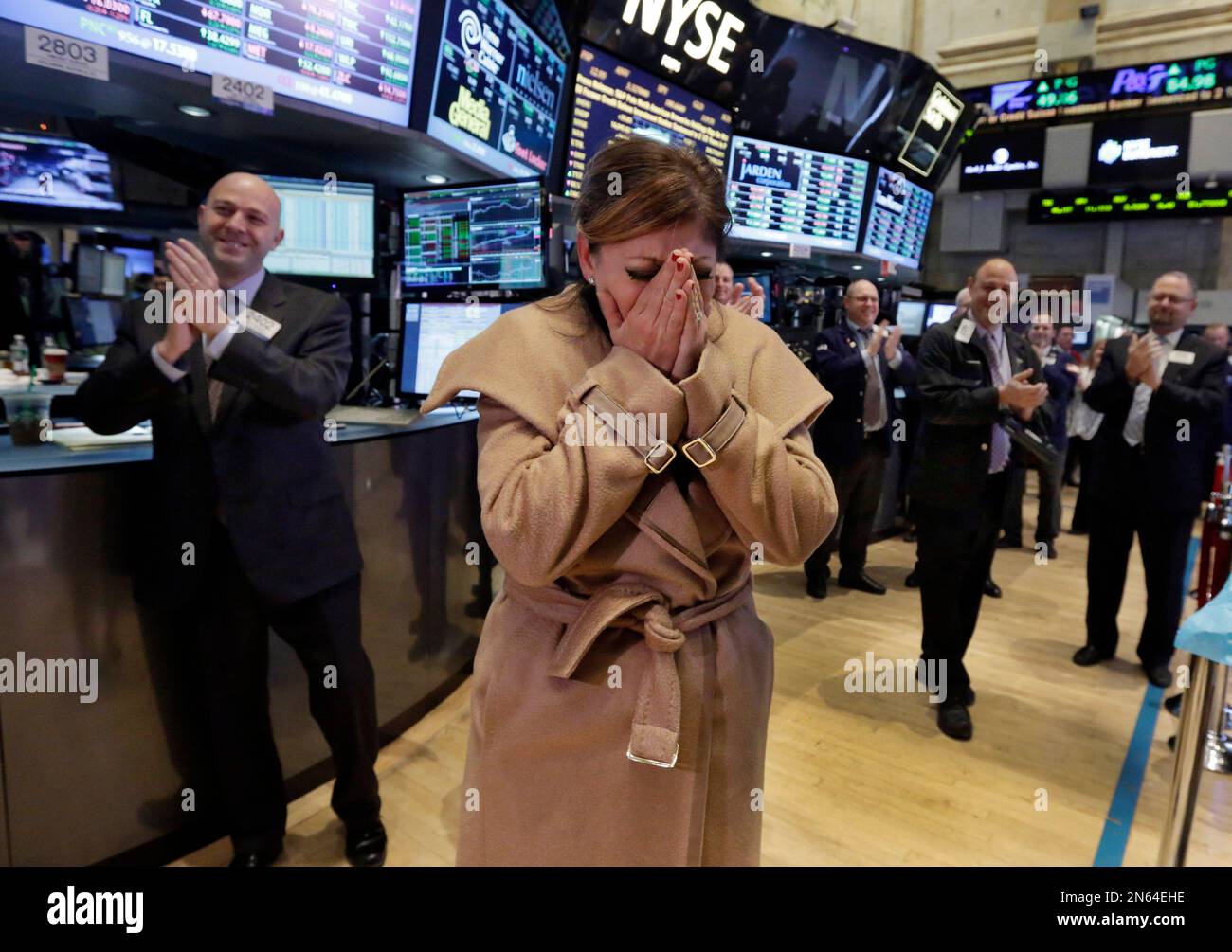 A tearful CNBC reporter Maria Bartiromo is overwhelmed as traders ...