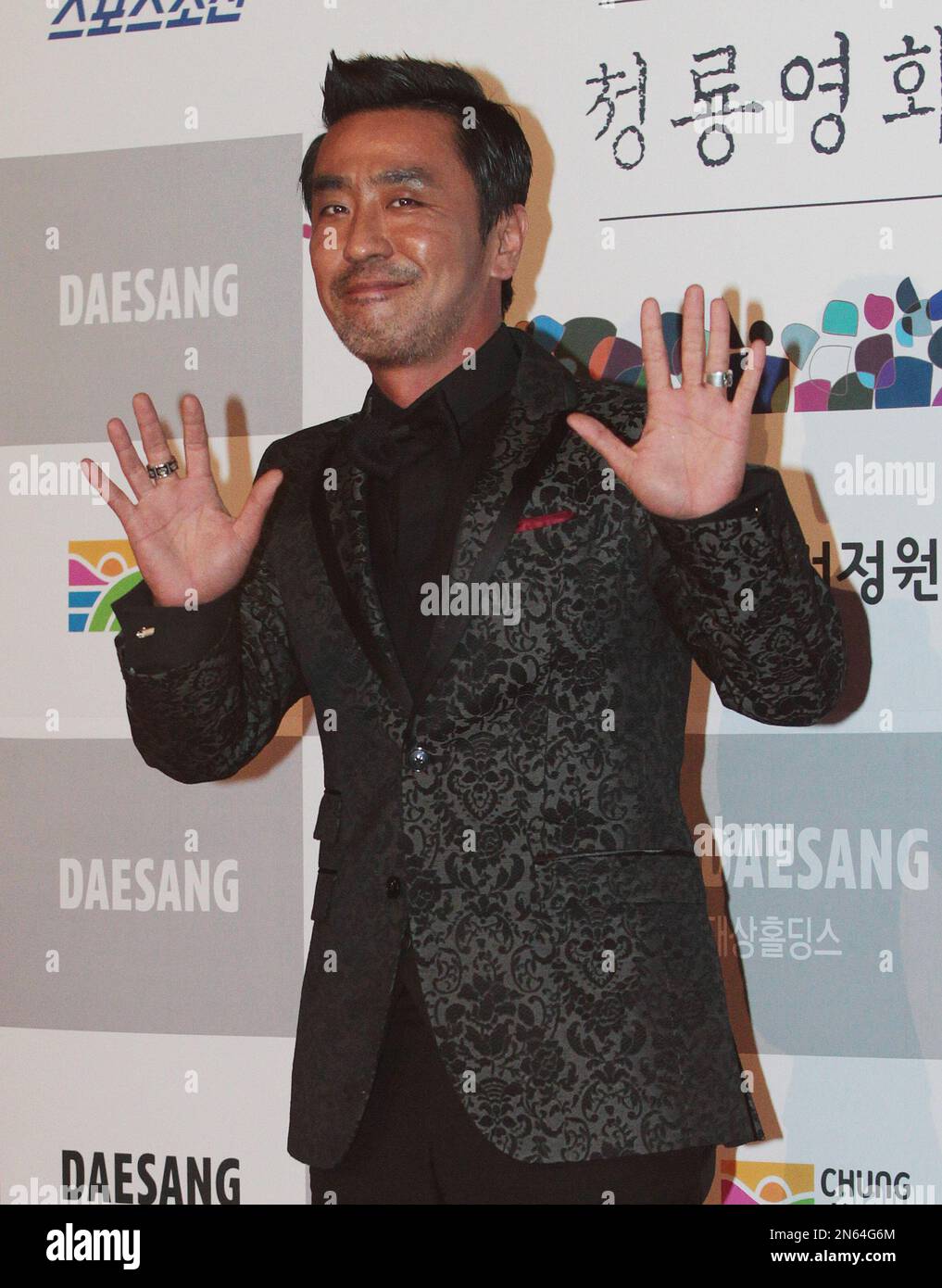 South Korean actor Ryu Seung-ryong poses during the Blue Dragon Awards ...