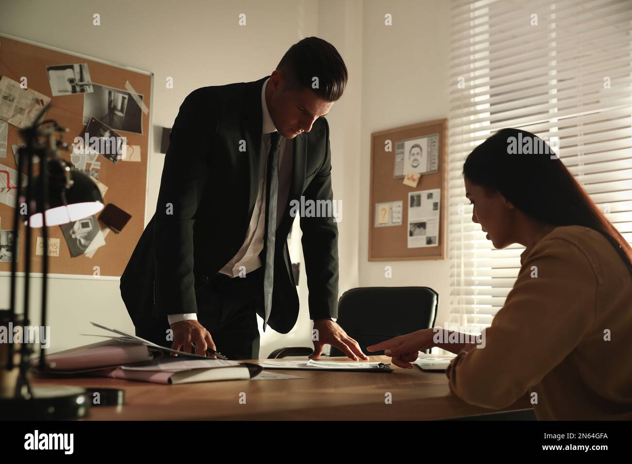 Female detective at work hi-res stock photography and images - Alamy