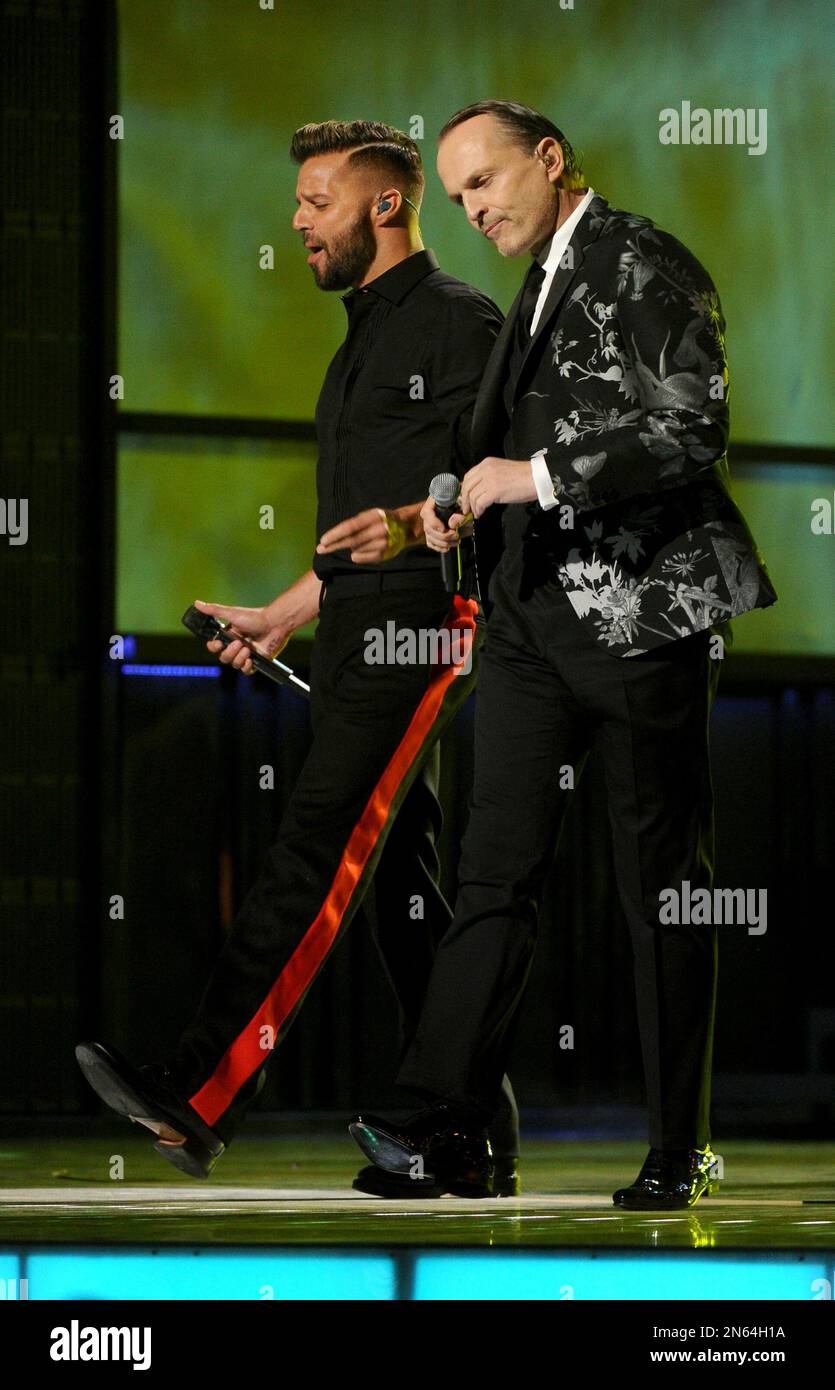From left, Ricky Martin and Miguel Bose perform onstage at the 14th ...