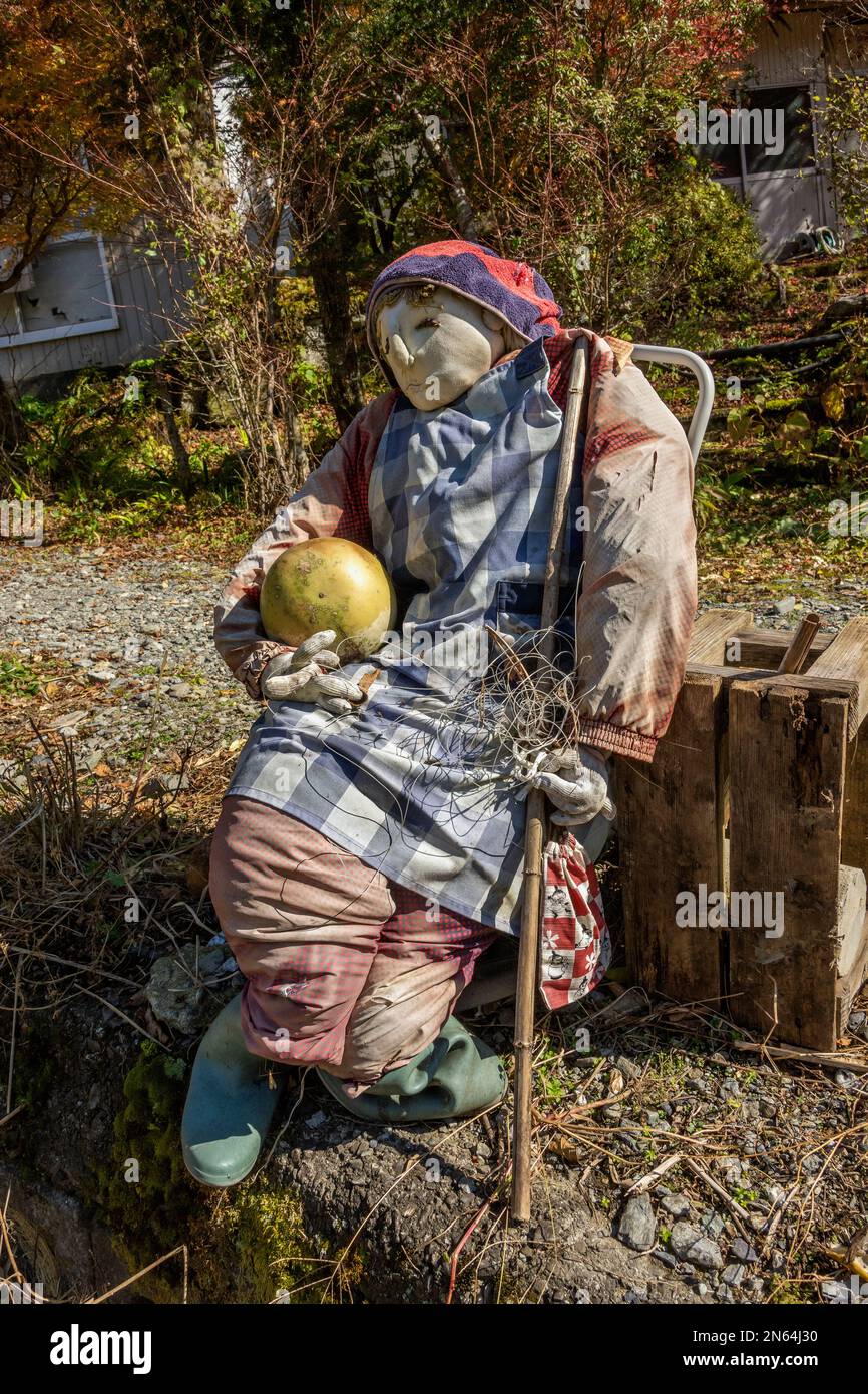 Seated woman kakashi with melon, Nagoro Doll Village, Iya Valley, Japan ...