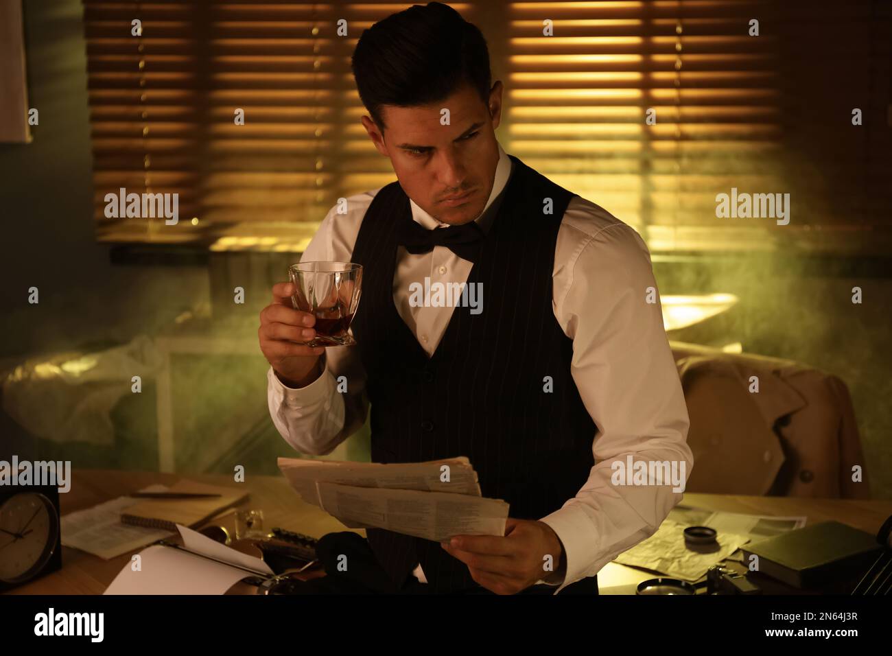 Professional detective working documents hi-res stock photography and ...