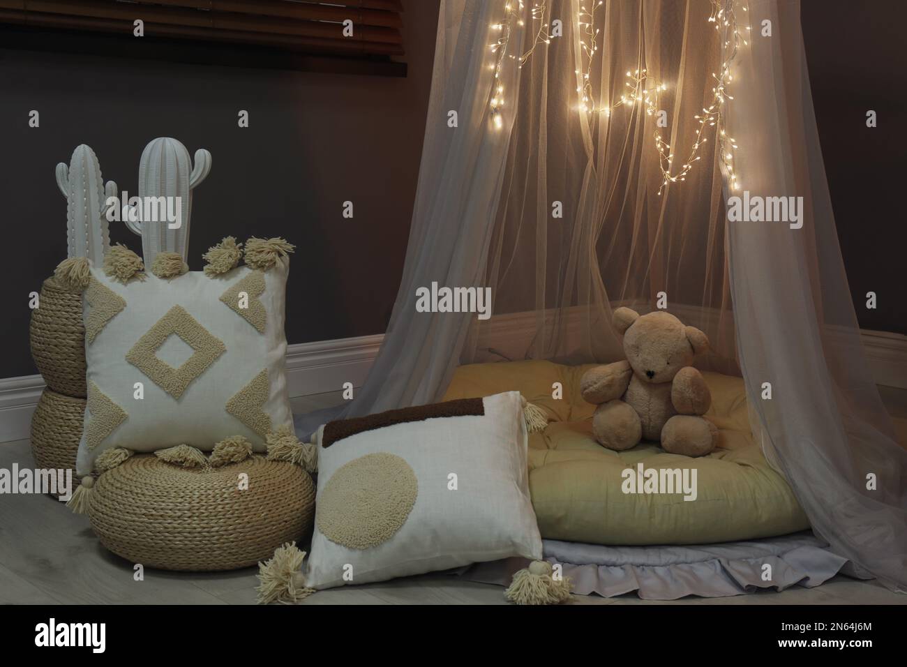 Cozy kids room interior with play tent and toys Stock Photo - Alamy