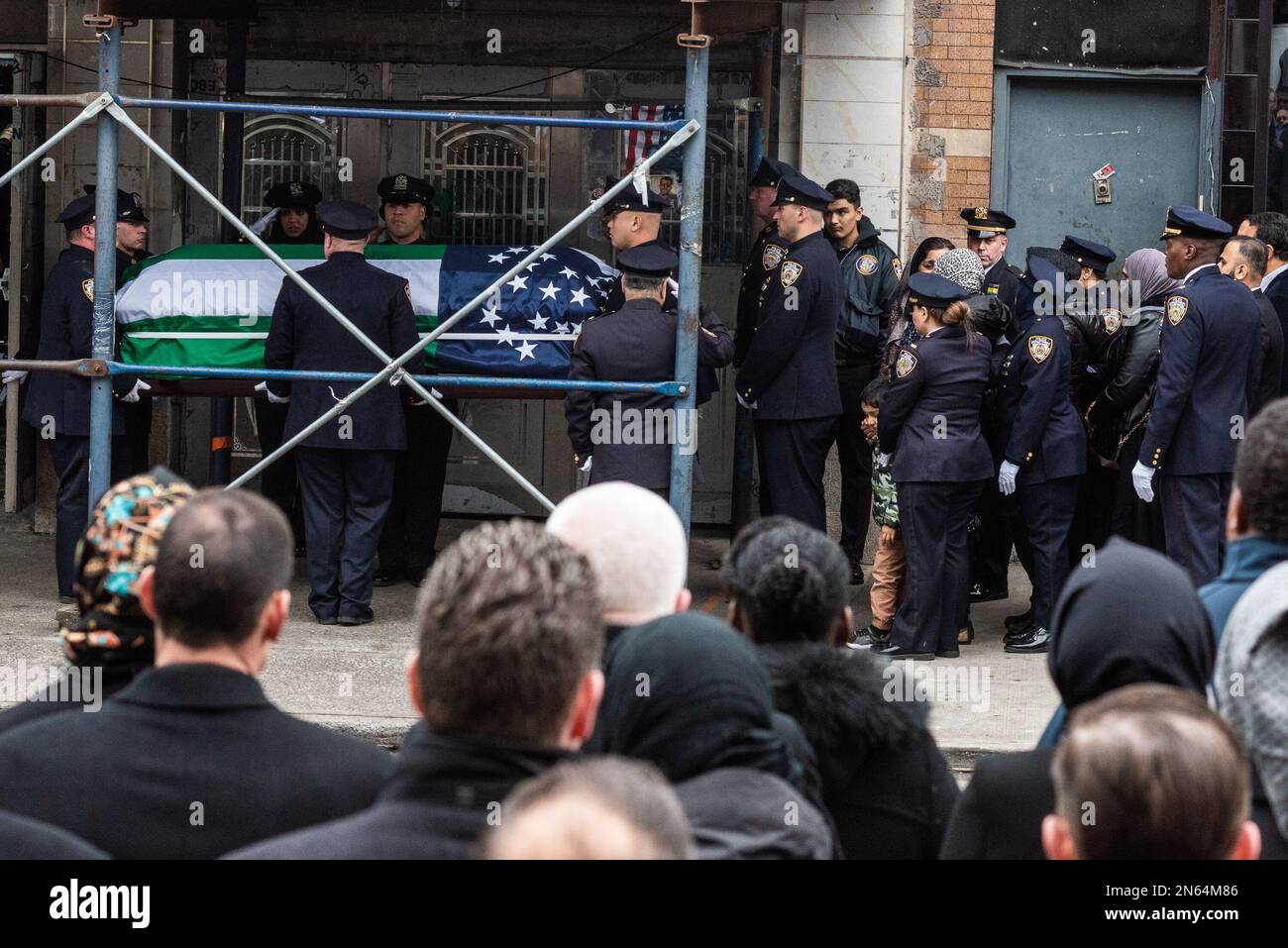 NYPD officers carry the casket of NYPD Officer Adeed Fayaz, who was ...