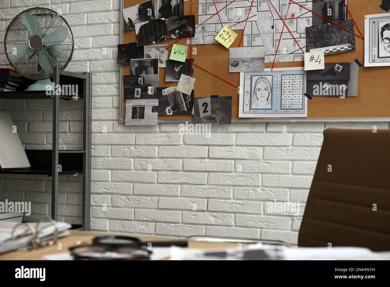 Modern detective office with workplace and board Stock Photo - Alamy