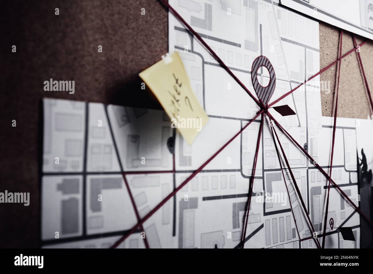 Detective board with map, sticker and red threads, closeup Stock Photo ...