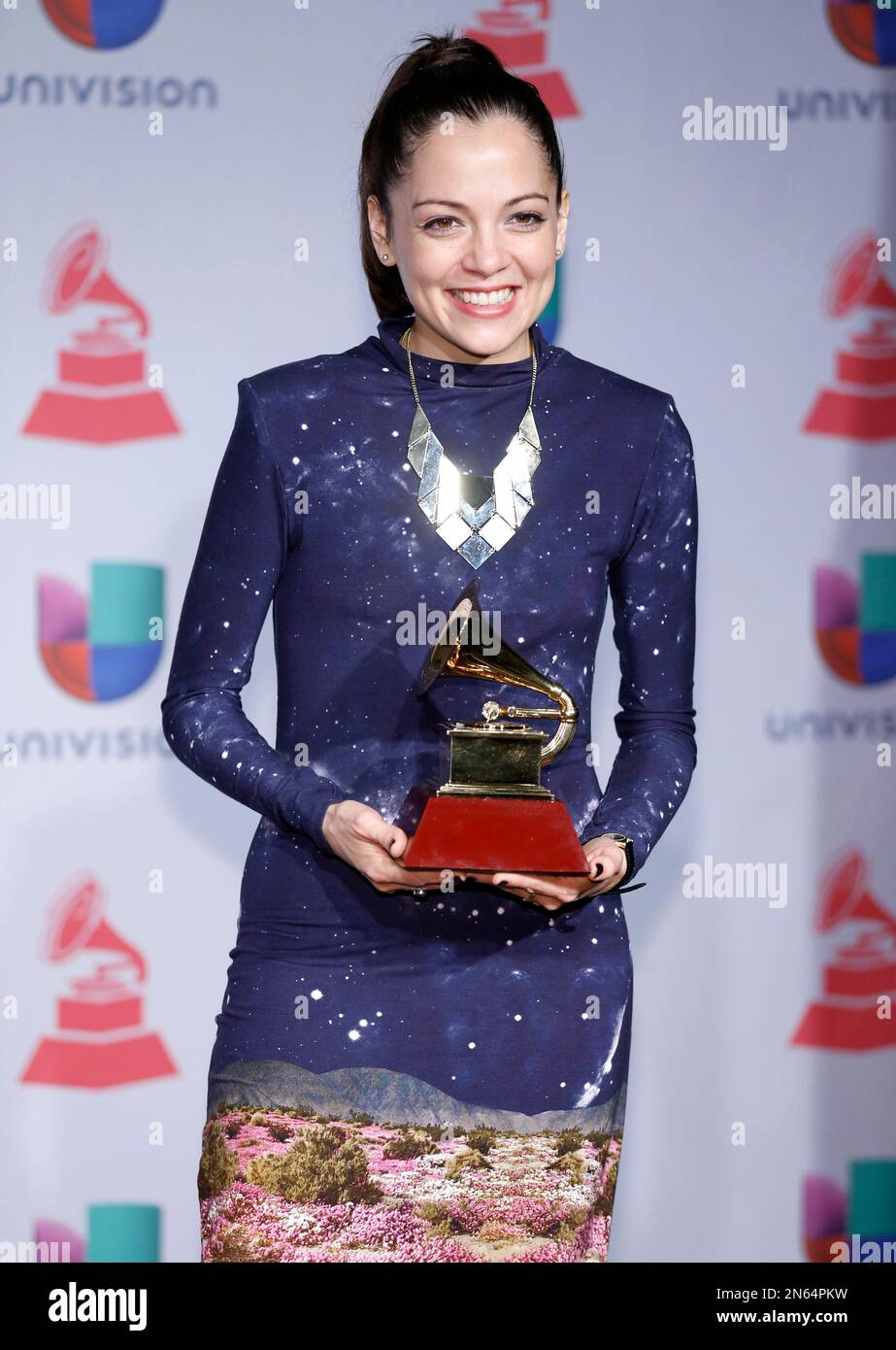 Natalia Lafourcade poses with her award for best alternative music ...