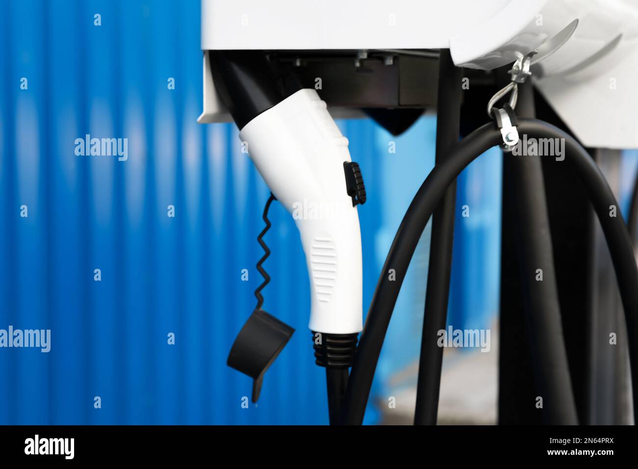 Electric vehicle charging station outdoors, closeup view Stock Photo ...