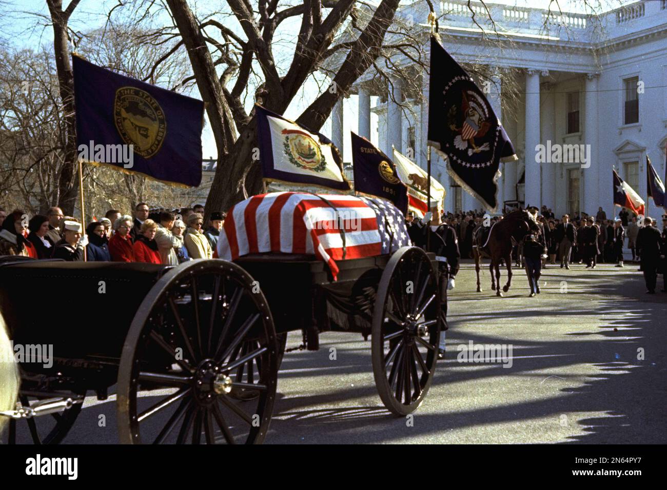 File - In this Nov. 25, 1963 file photo, the caisson bearing the flag ...