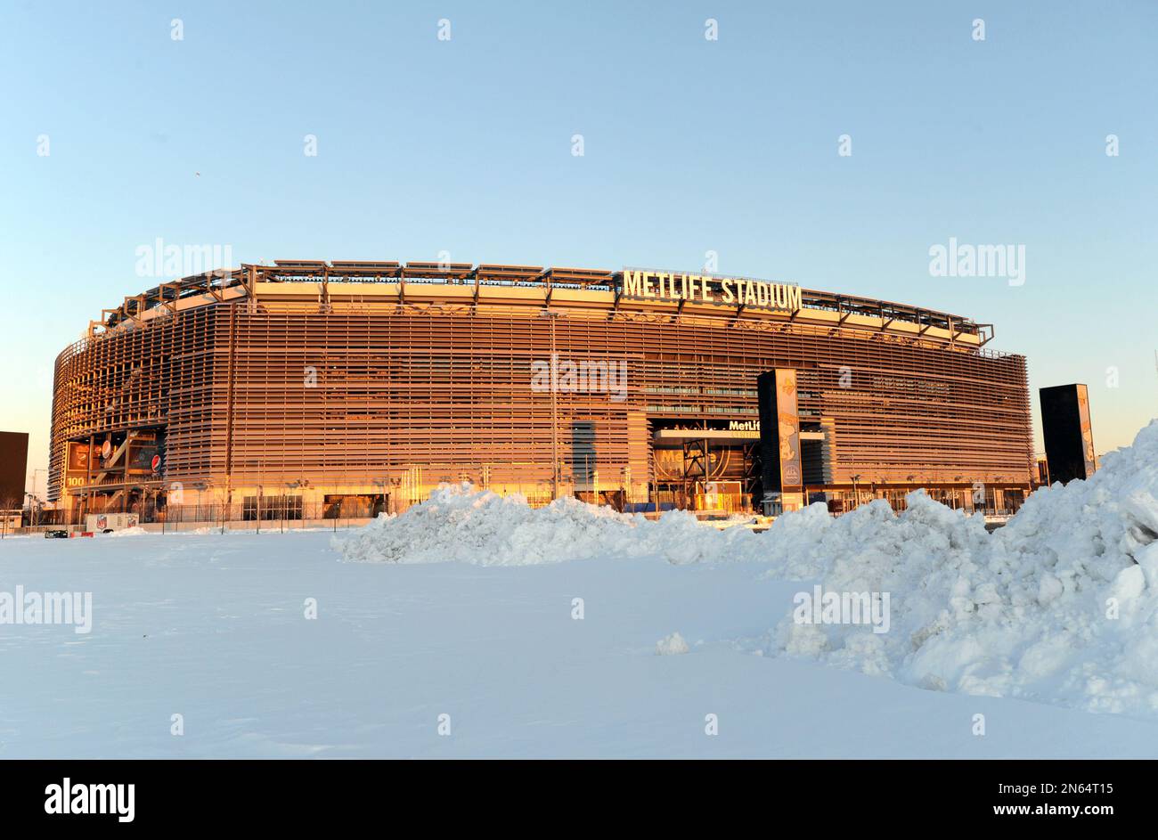 FILE - In this Feb. 9, 2013, file photo, snow is piled high in a ...
