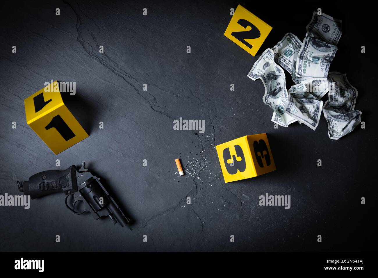 Flat lay composition with evidences and crime scene markers on black ...
