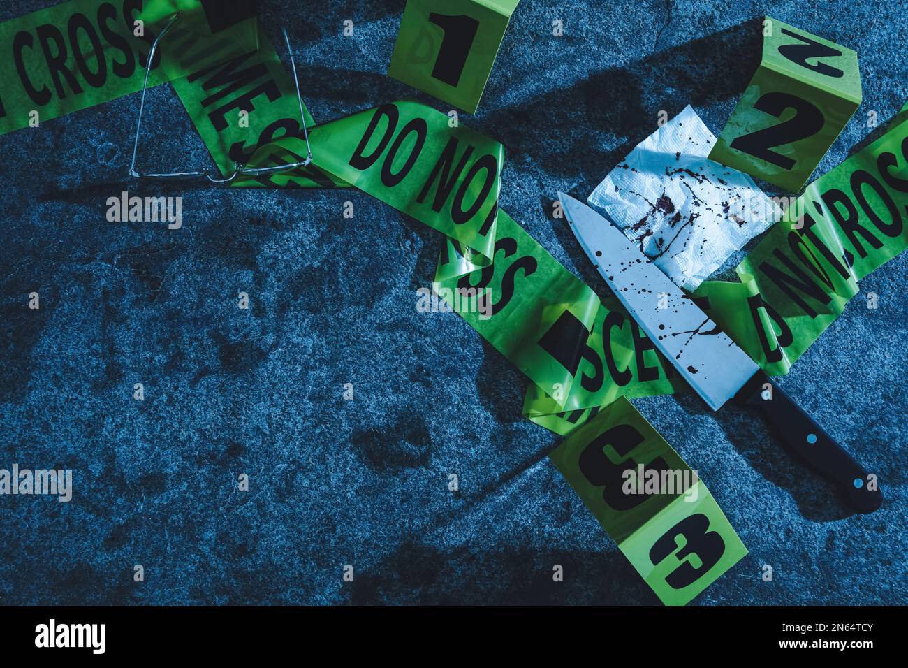 Flat lay composition with evidences and crime scene markers on stone ...