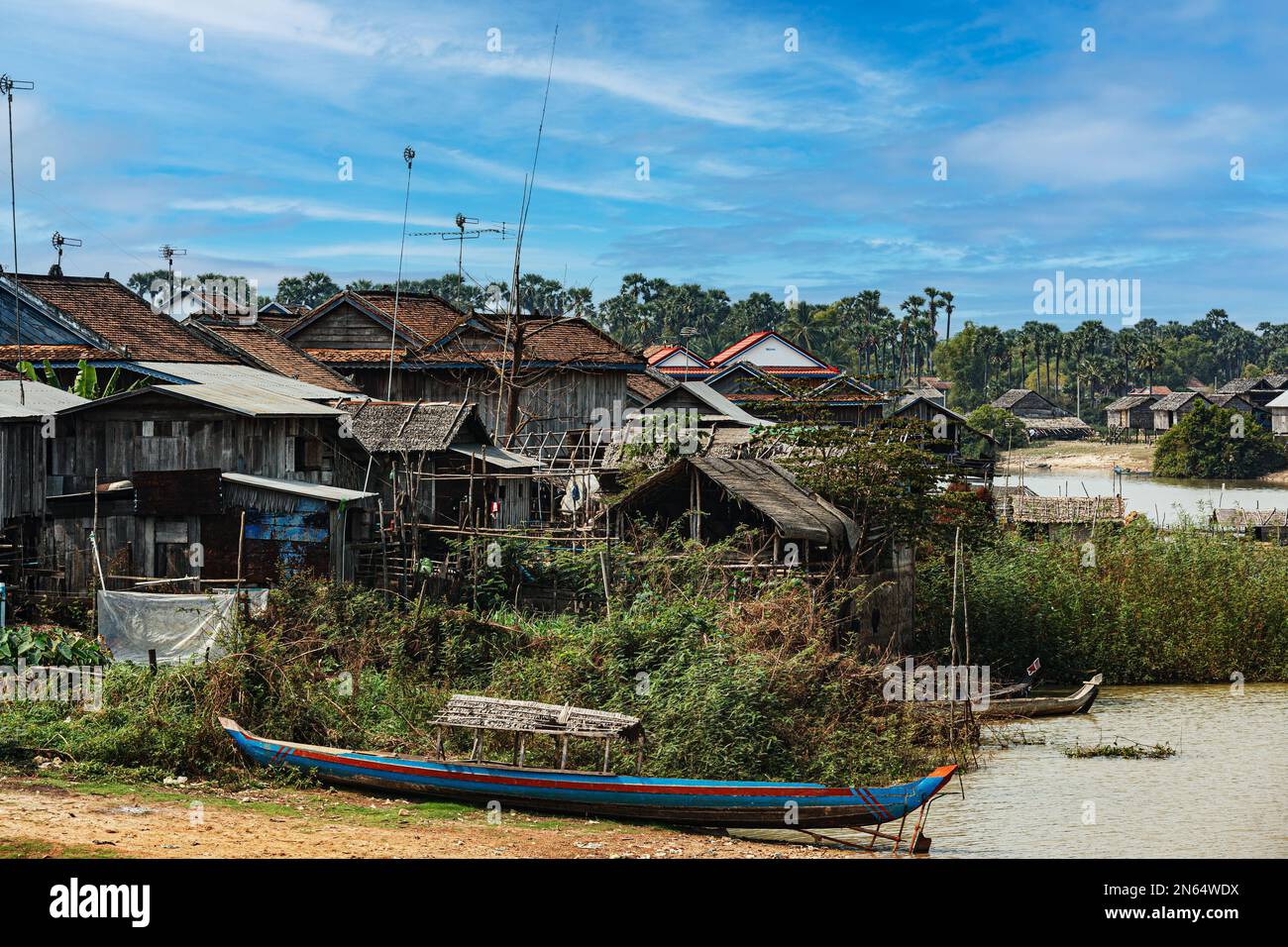 Poor Cambodians living in poverty along a river in South East Asia ...