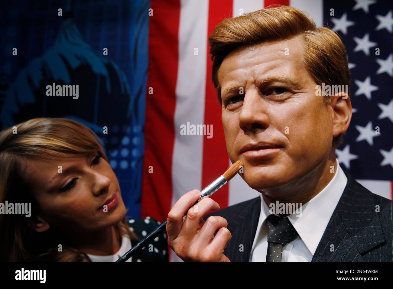 Clare Calvin, left, a colouring assistant with Madame Tussauds tourist ...