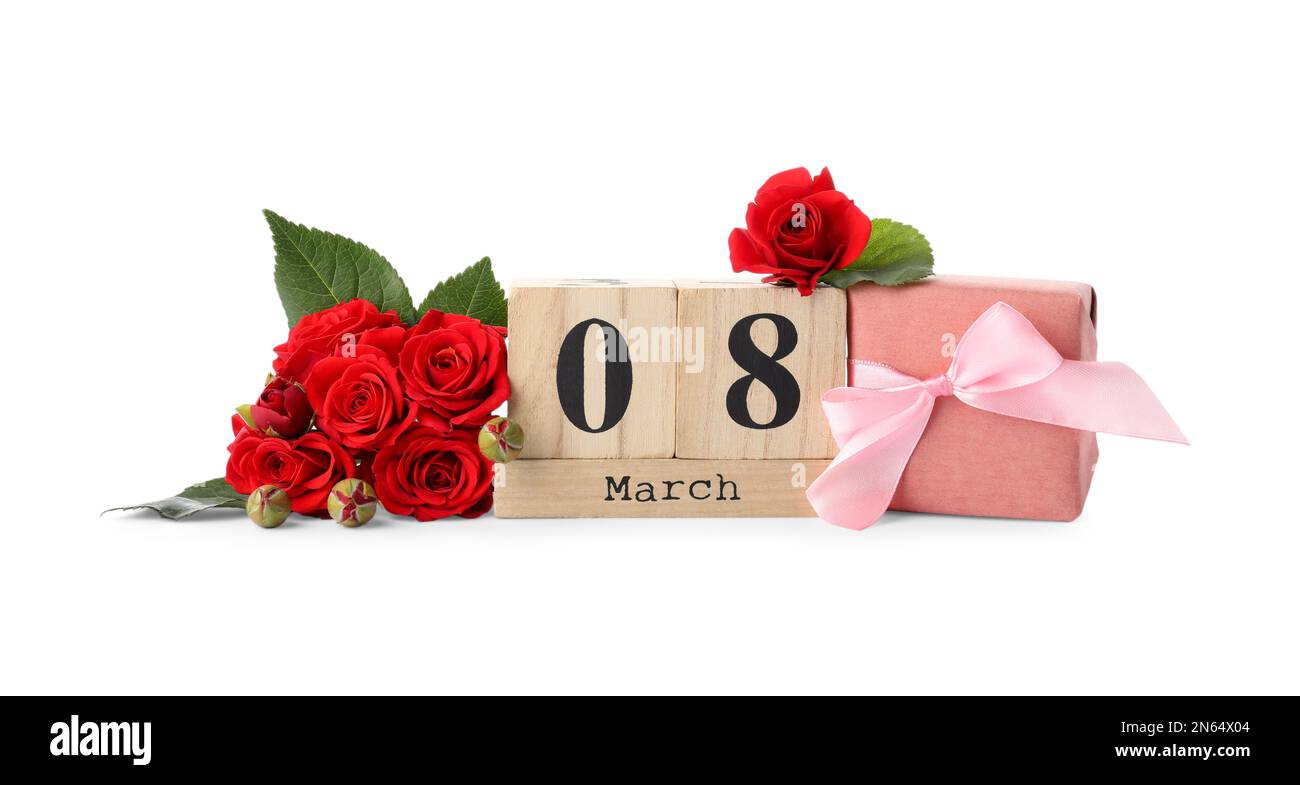 Wooden block calendar with date 8th of March, roses and gift box on ...