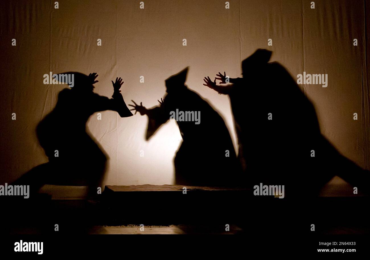 Inmates of Bucharest's Rahova penitentiary cast shadows while ...