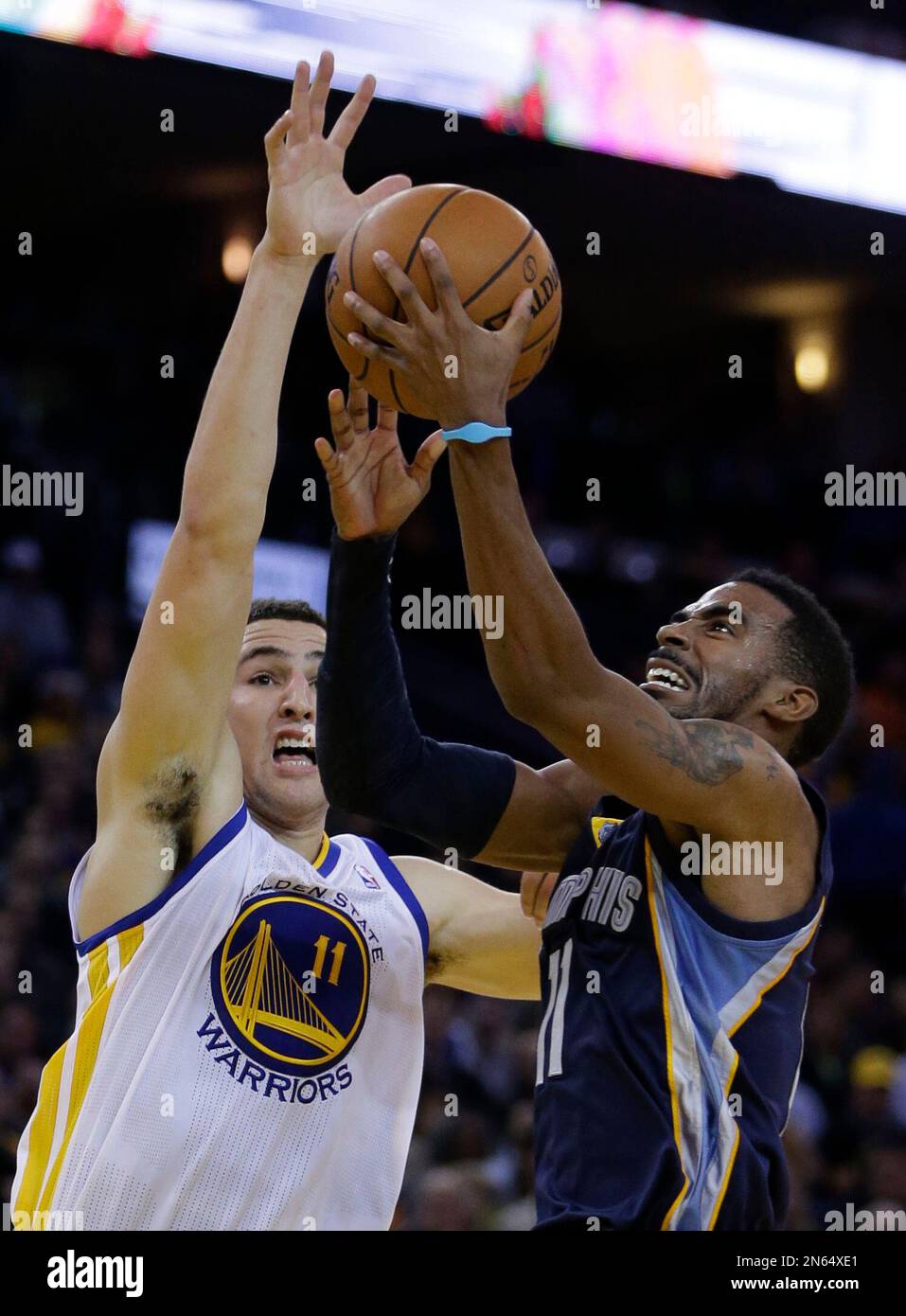 Memphis Grizzlies' Mike Conley, right, shoots over Golden State ...